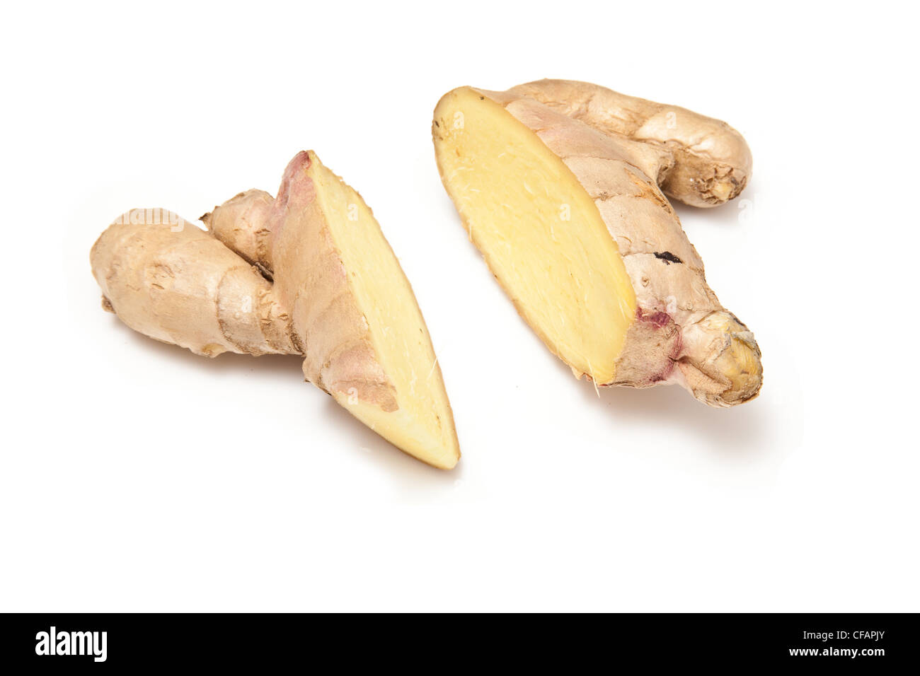 Root ginger (Zingiber officinalis) isolated on a white studio ...