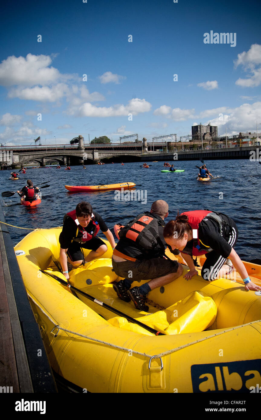Boats compete during the Glasgow "rat race" event on the river clyde ...