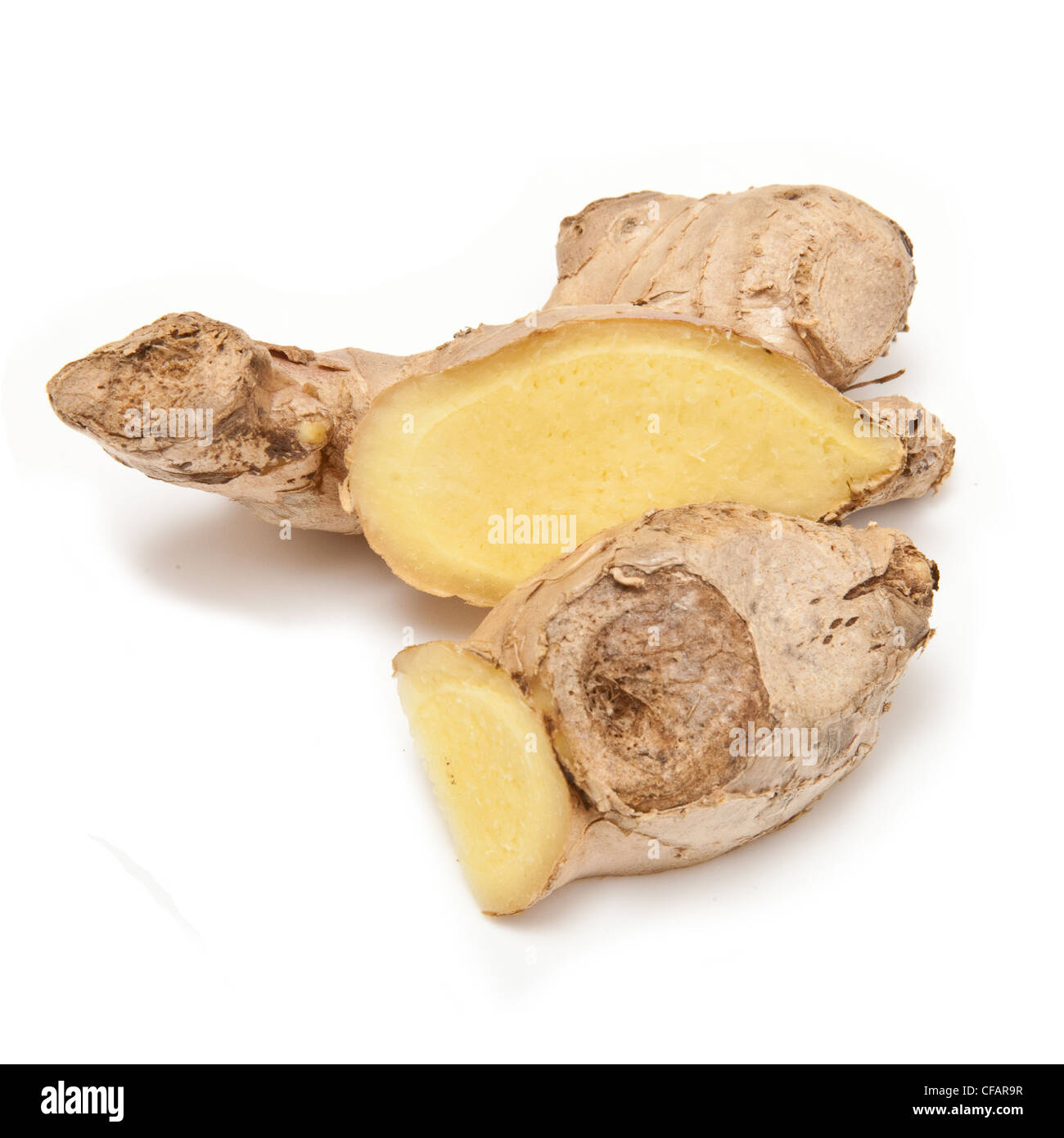 Root Ginger (Zingiber officinale) isolated on a white studio background ...