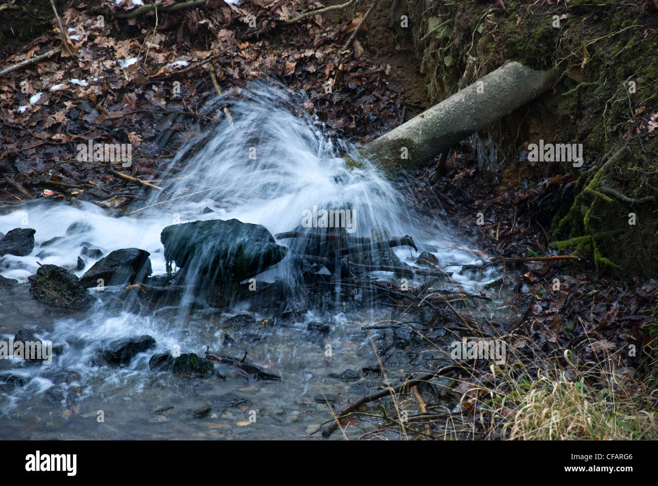 Broken pipe gushing water Stock Photo - Alamy