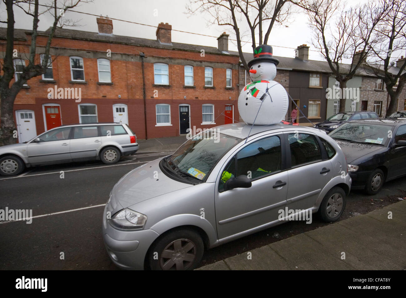Inflatable snowman on a car roof in Dun Laoghaire Dublin Ireland Stock ...