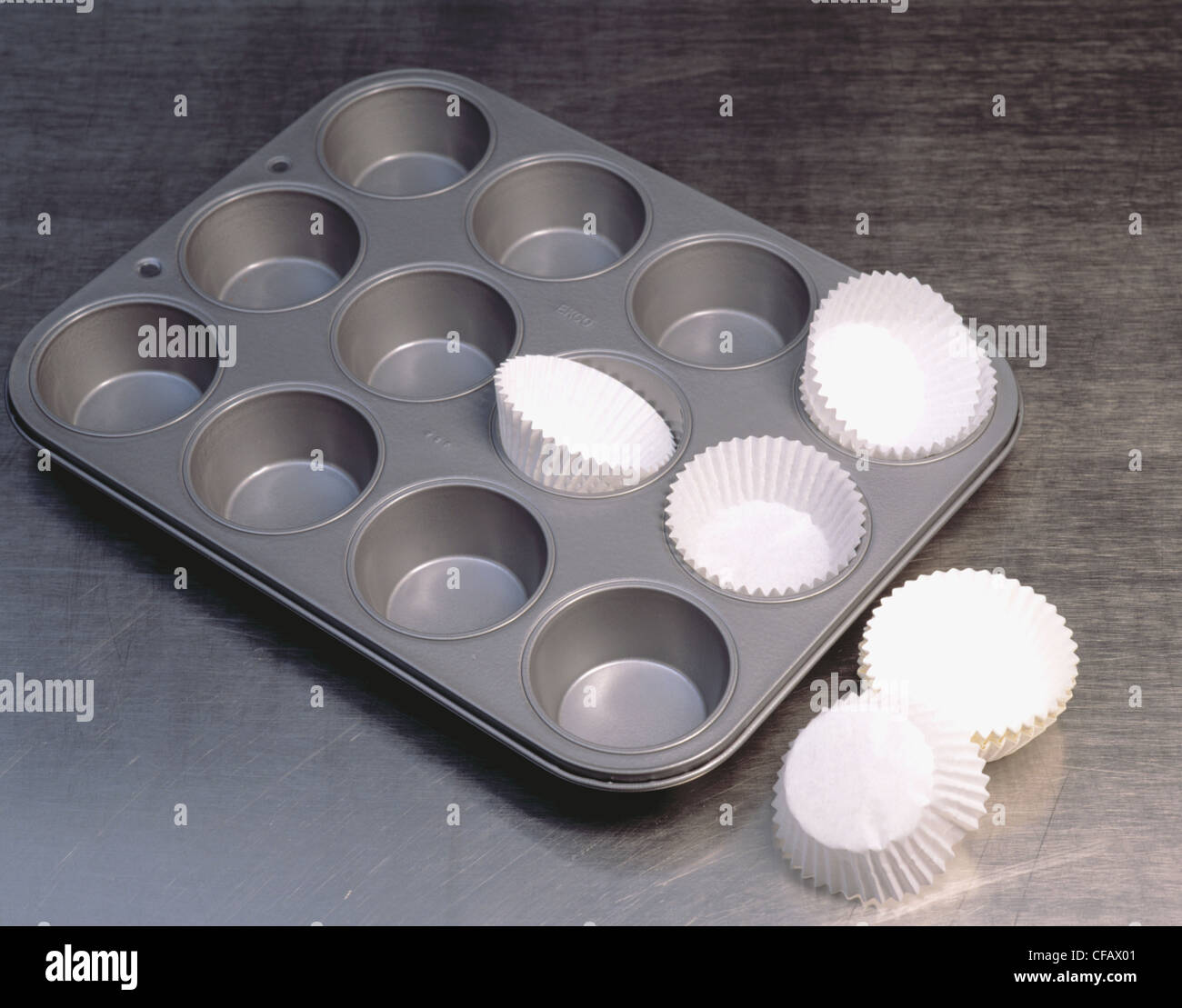 Muffin Step 4. Putting paper forms into the baking mould Stock Photo ...