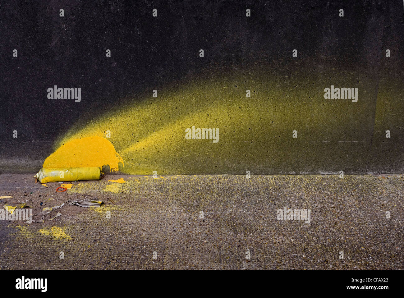 Burst yellow spray paint can on side of road, London, UK Stock Photo ...