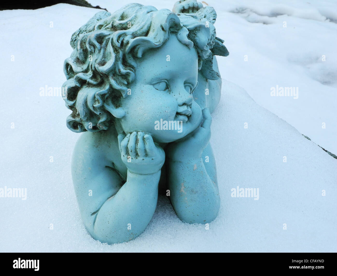 Angel, child, symbol, concepts, recumbent, snow, cemetery, grief Stock ...