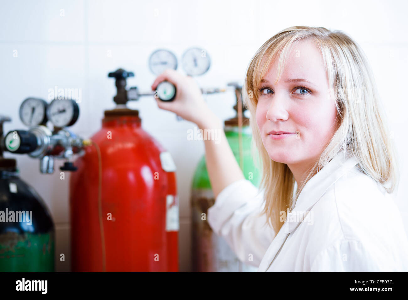 Closeup of a female researcher/chemistry student carrying out ...