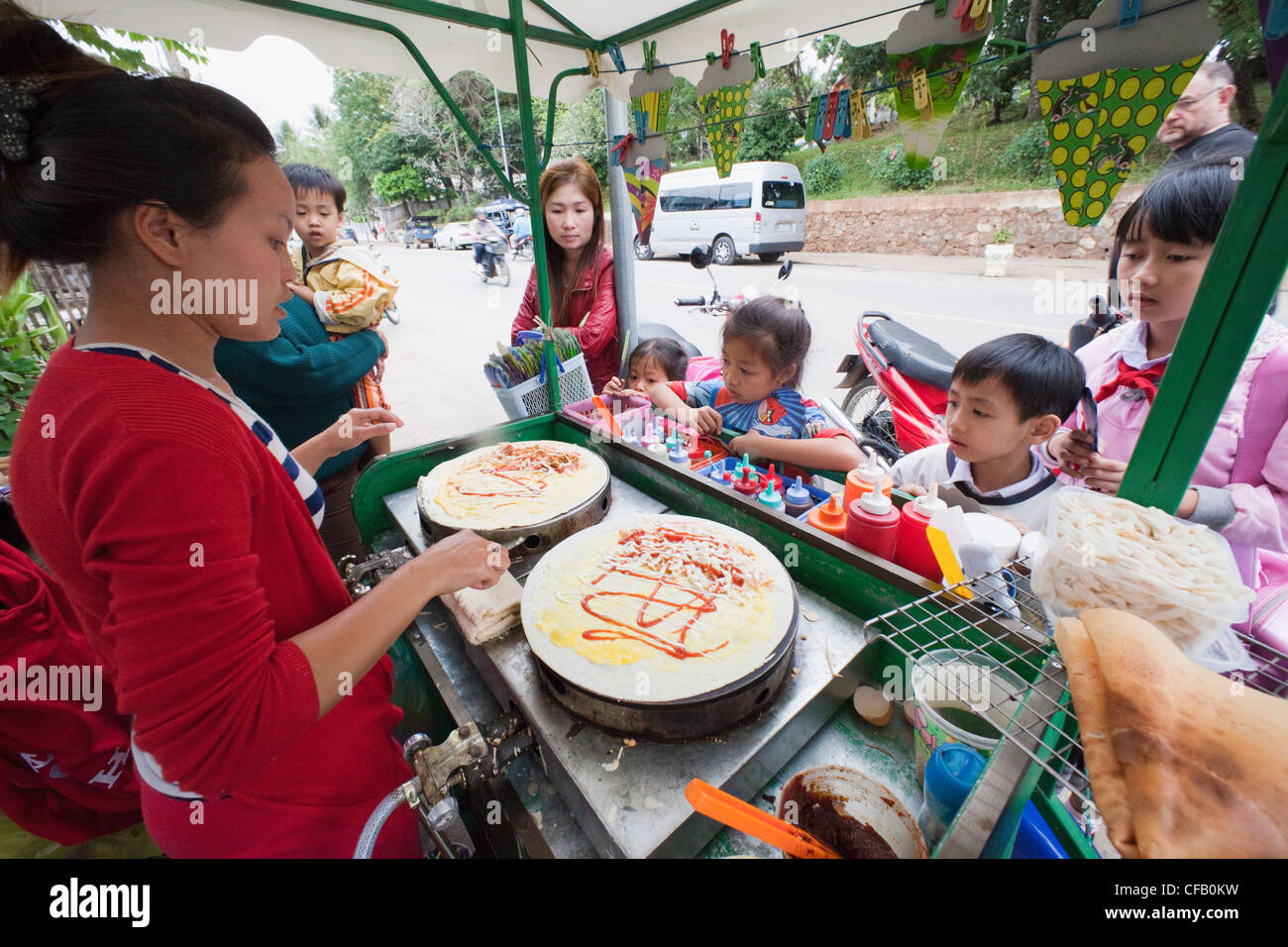 Laos, Luang Prabang, Street Vendor Making Crepes Stock Photo - Alamy