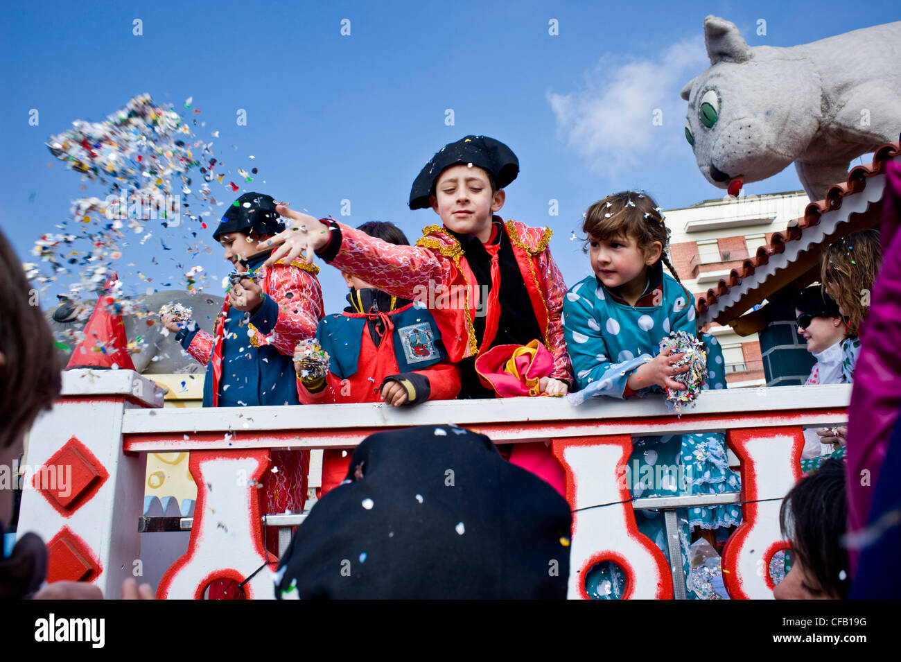 Bullfighter, costumes and confetti at the parade of the traditional ...