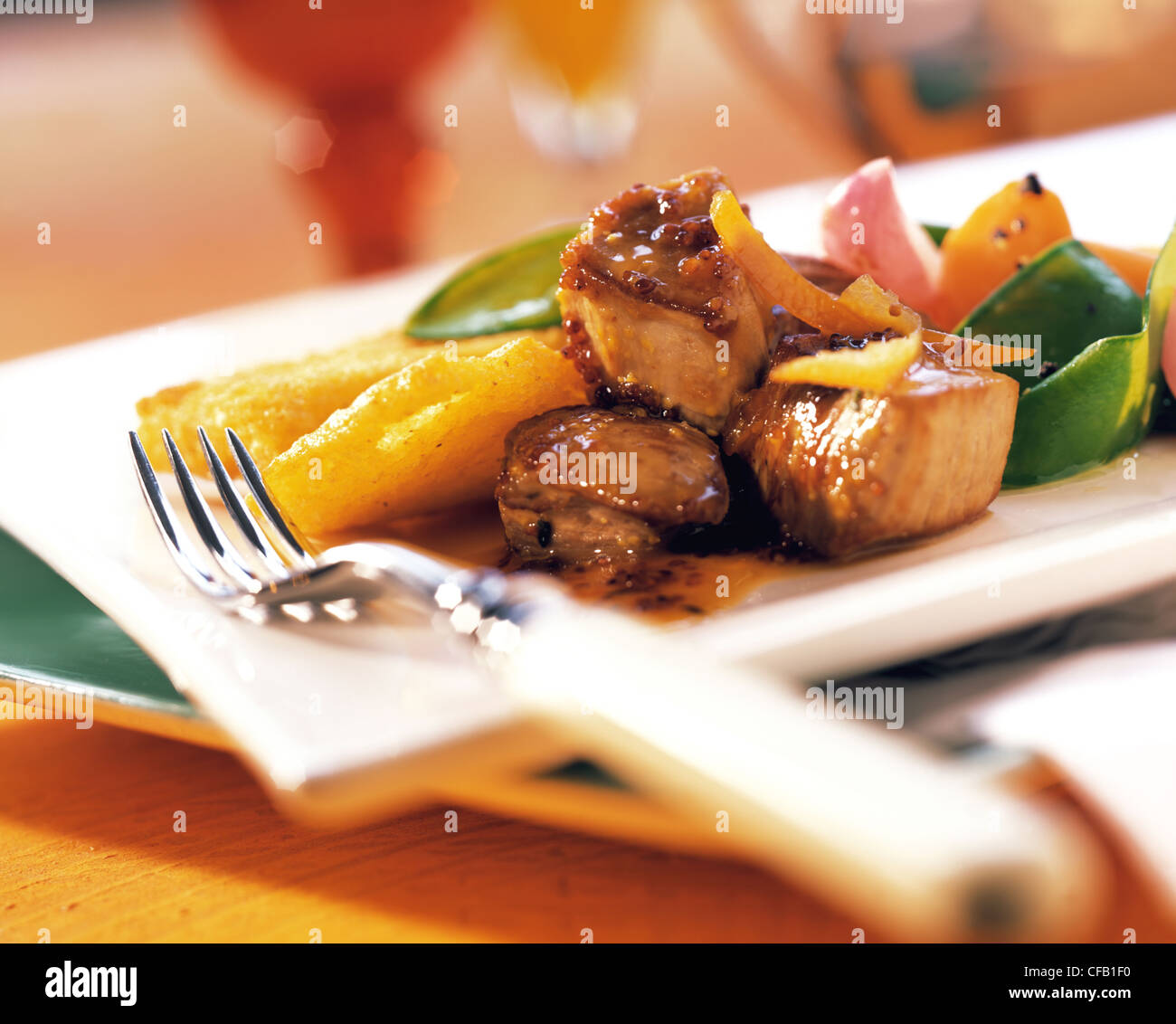 Orange lamb with vegetable sauté Stock Photo - Alamy