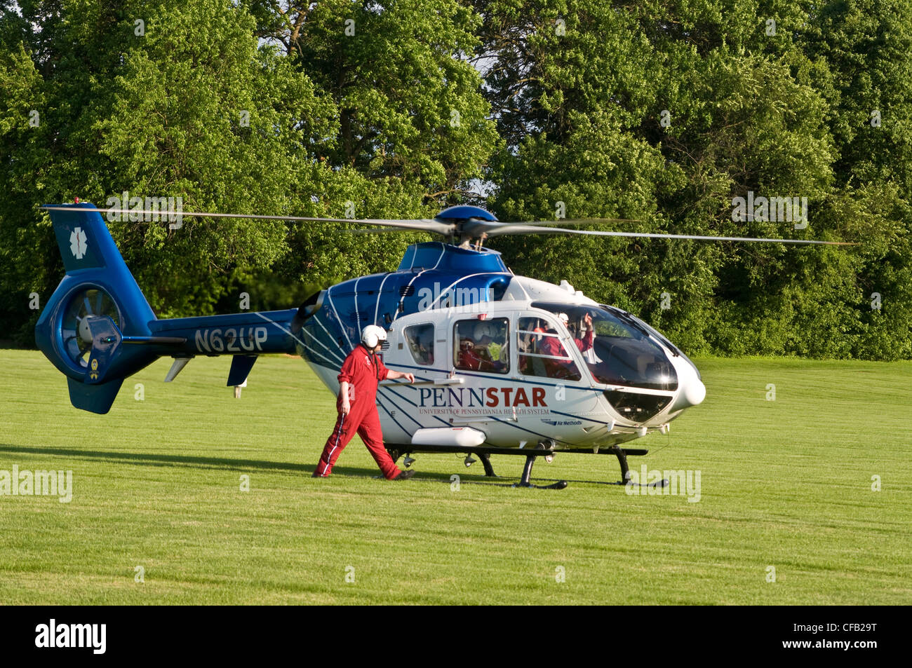 Lifeline emergency helicopter transporting patient to hospital Stock ...