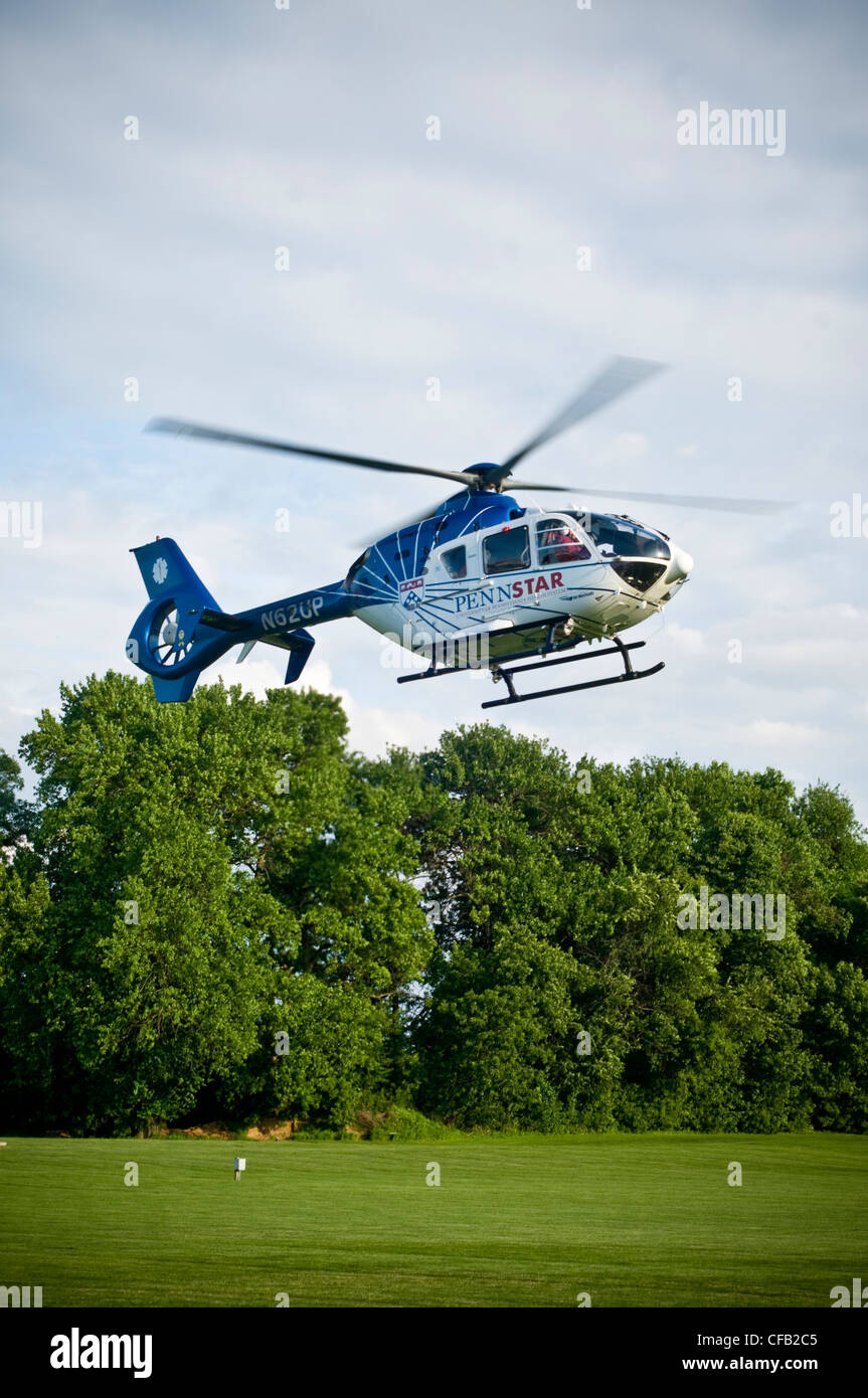Lifeline emergency helicopter transporting patient to hospital Stock ...