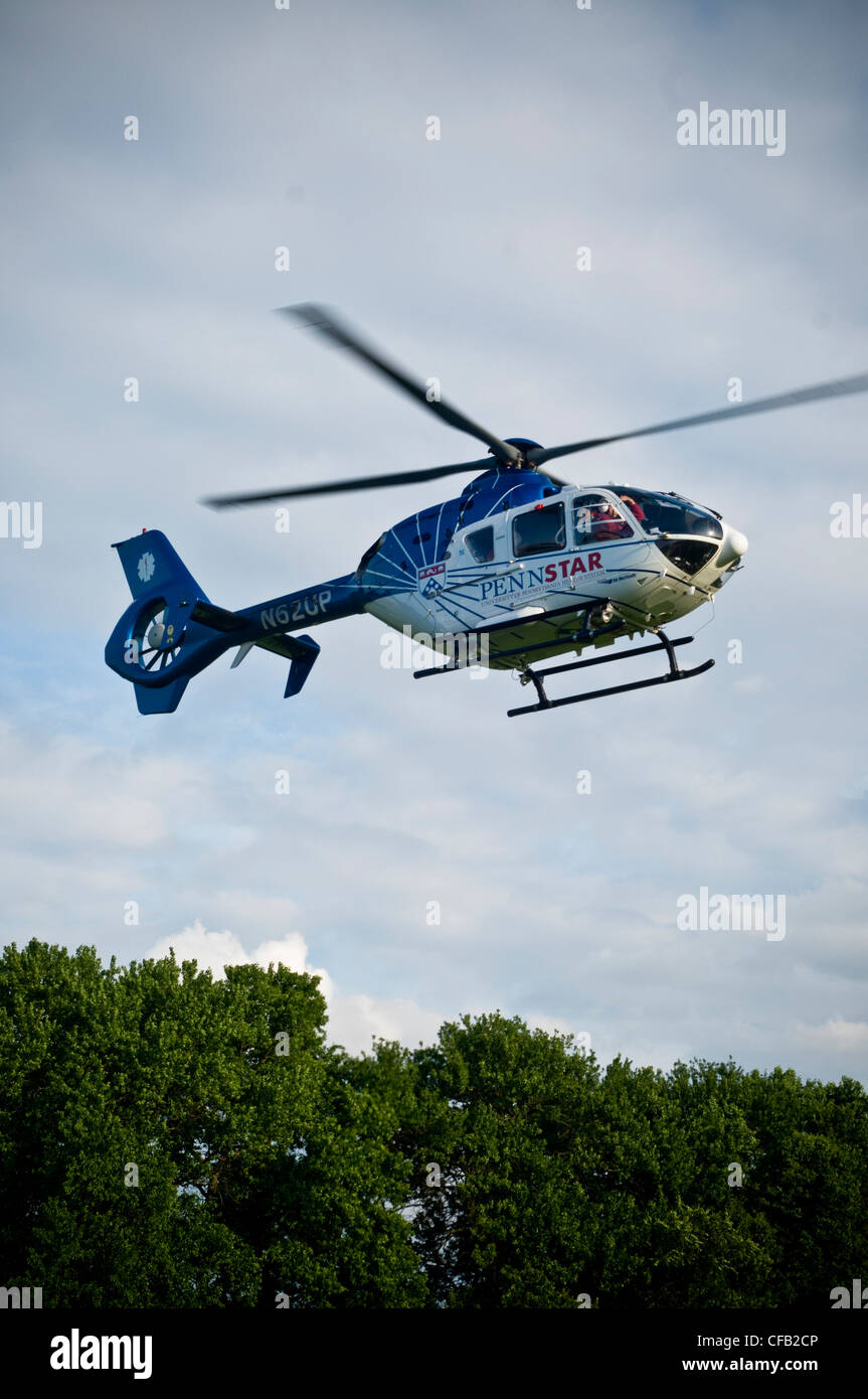 Lifeline emergency helicopter transporting patient to hospital Stock ...
