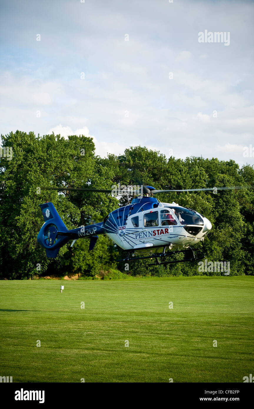 Lifeline emergency helicopter transporting patient to hospital Stock ...