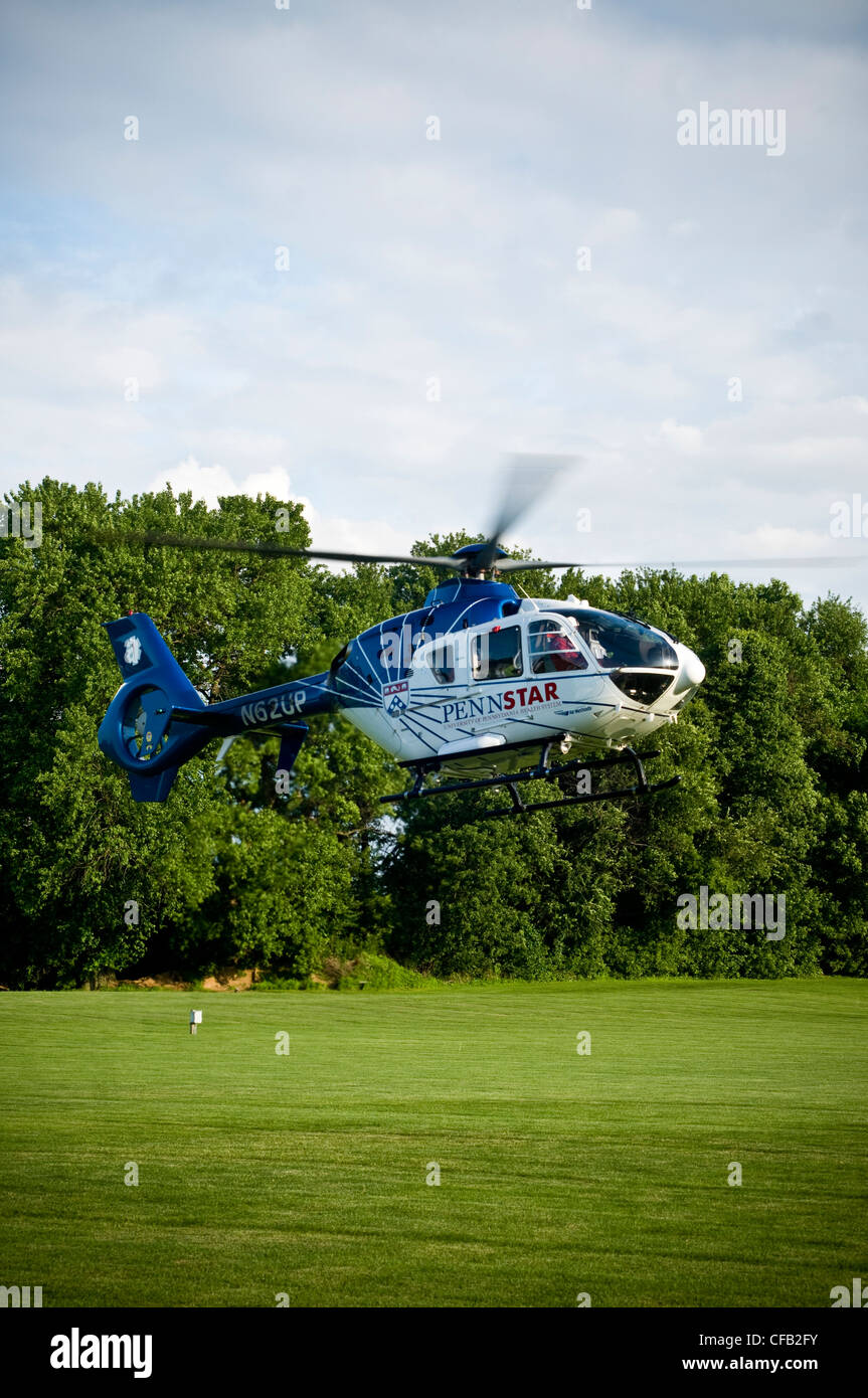Lifeline emergency helicopter transporting patient to hospital Stock ...