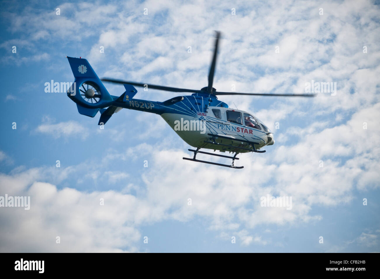 Lifeline emergency helicopter transporting patient to hospital Stock ...