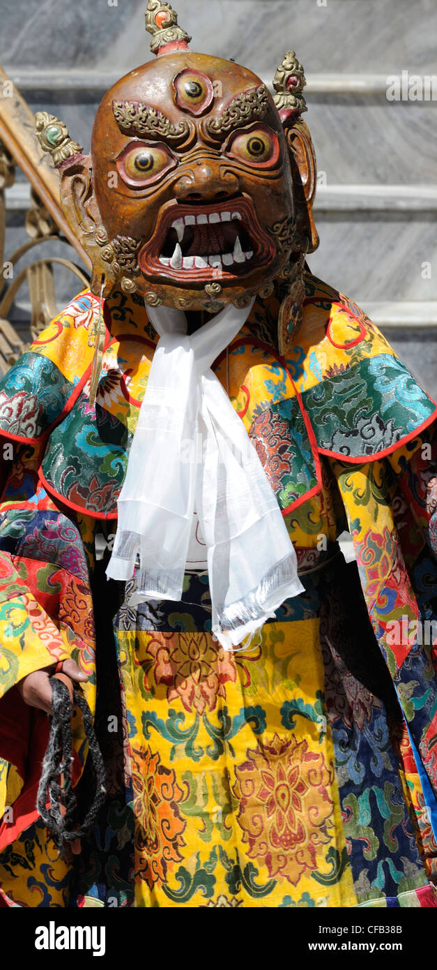 Masked dancer in the form of a demon at the Leh festival in the ...