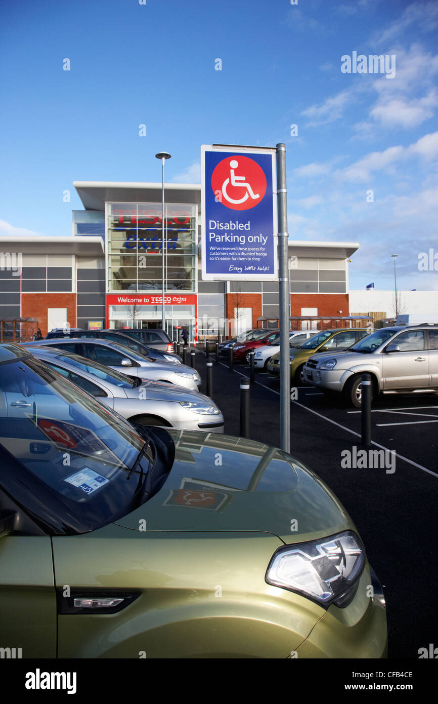 disabled car parking spaces outside tesco extra supermarket outside ...