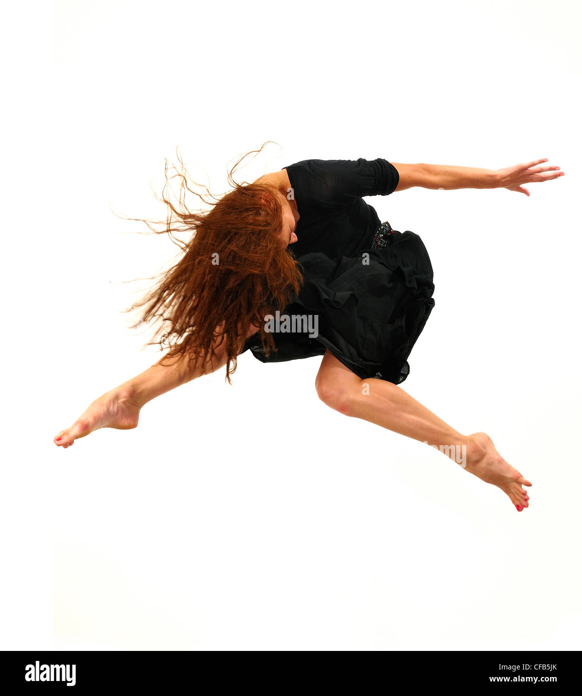 Contemporary female dancer jumping isolated on white Stock Photo - Alamy
