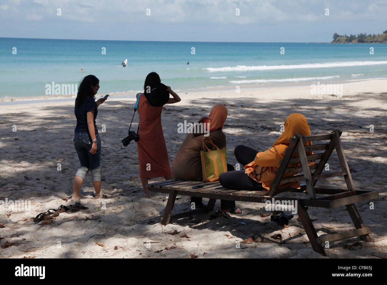 Muslim women at a beach in Sabah, Borneo, Malaysia Stock Photo - Alamy