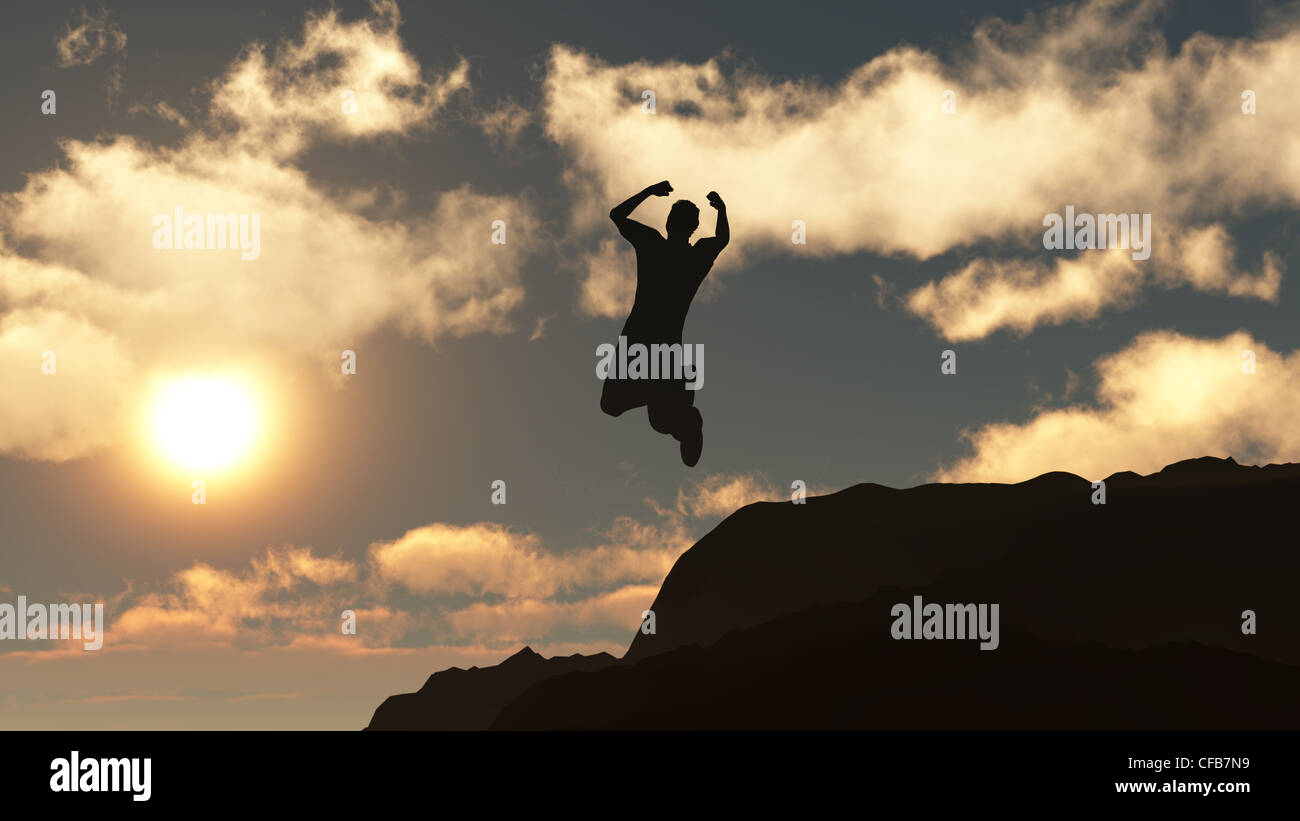 Silhouette of the jumping man from a rock. A sunset Stock Photo - Alamy