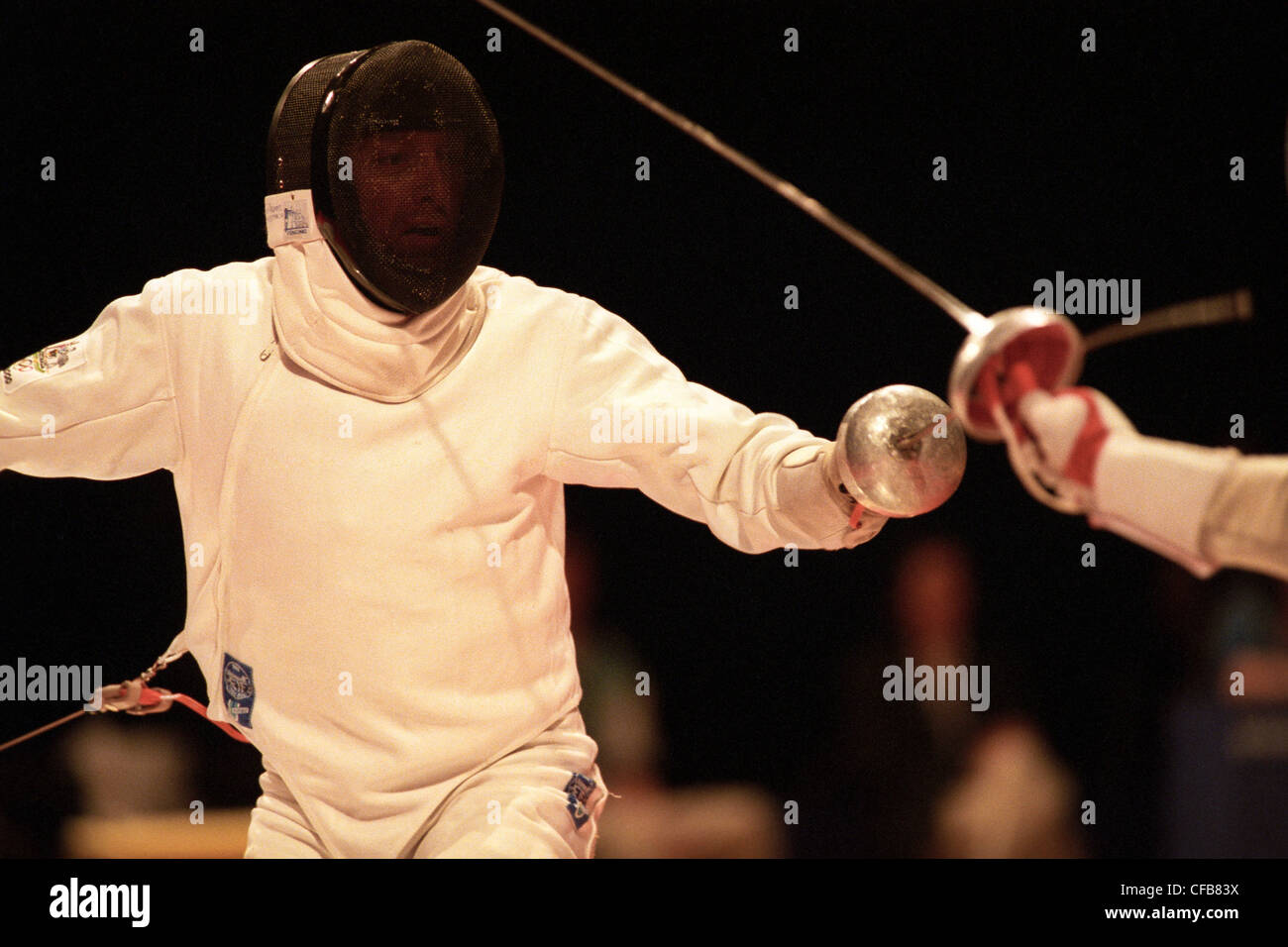 Male fencer in action hi-res stock photography and images - Alamy