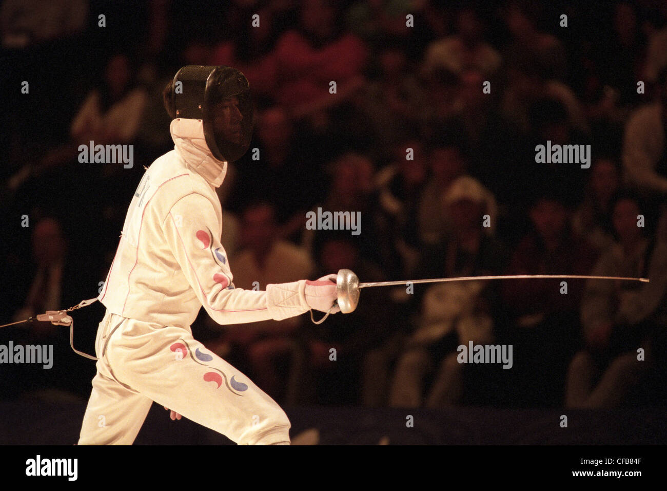 Male fencer in action hi-res stock photography and images - Alamy