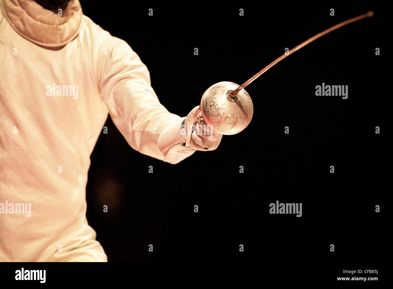 Male fencer in action Stock Photo - Alamy