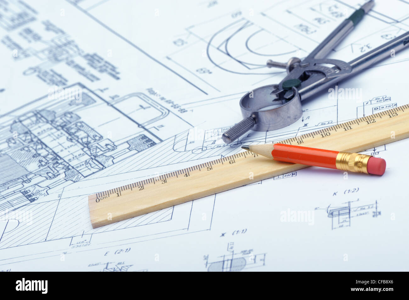 The plan industrial details, a protractor, caliper, divider and a red ...