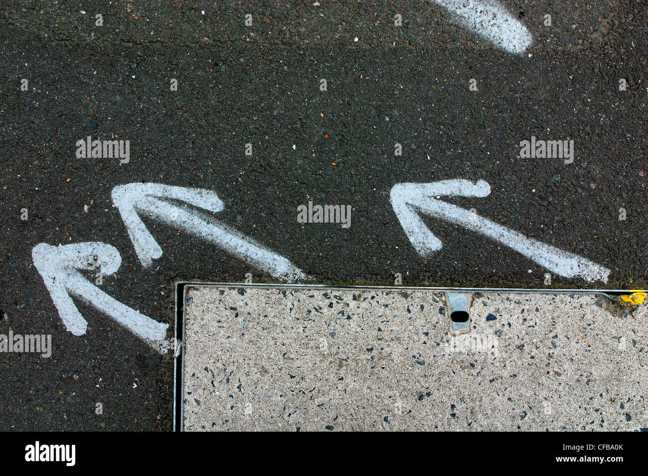 Arrows on road, London, UK Stock Photo - Alamy