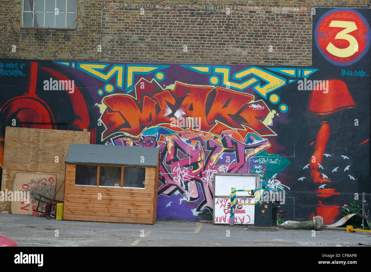 Shed in yard with graffiti, Hackney, London, UK Stock Photo - Alamy