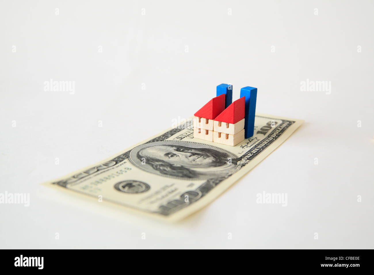 House on the money Stock Photo - Alamy