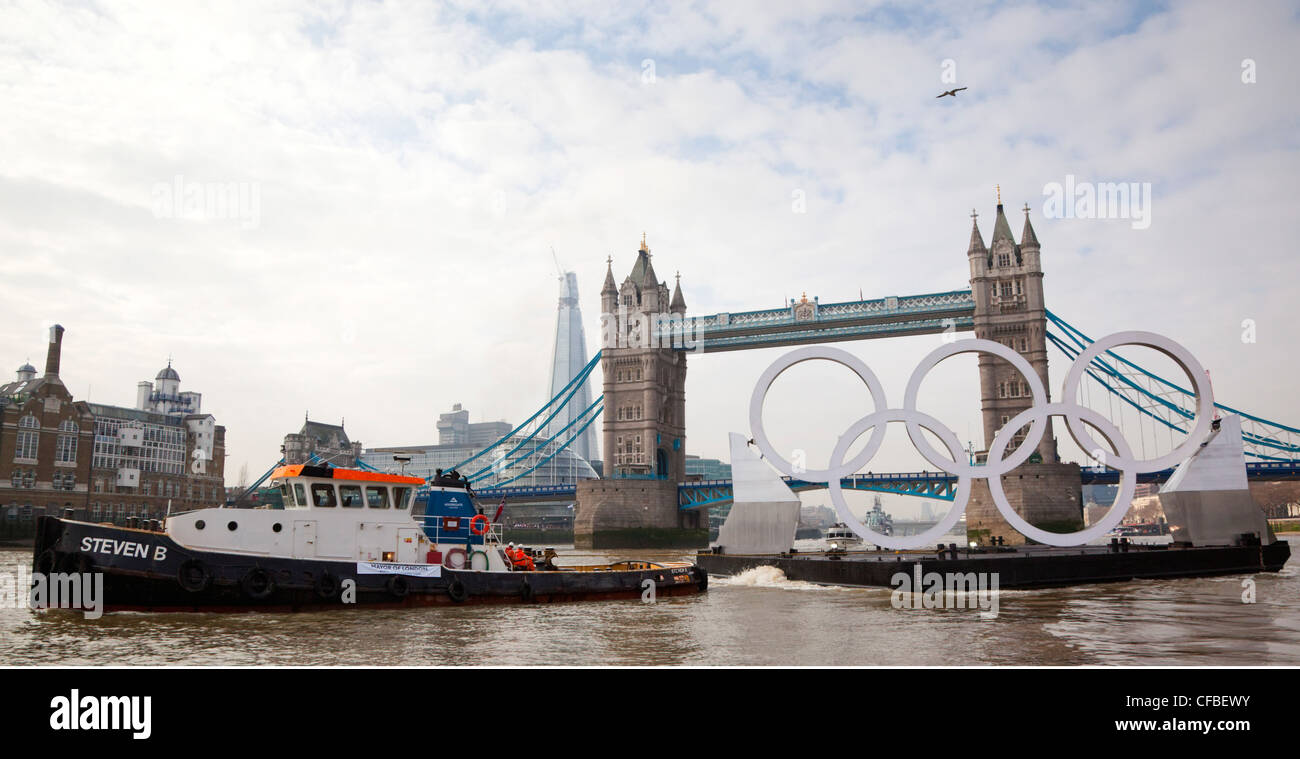 Large Olympic rings, 11m high by 25m wide are floated down the River ...