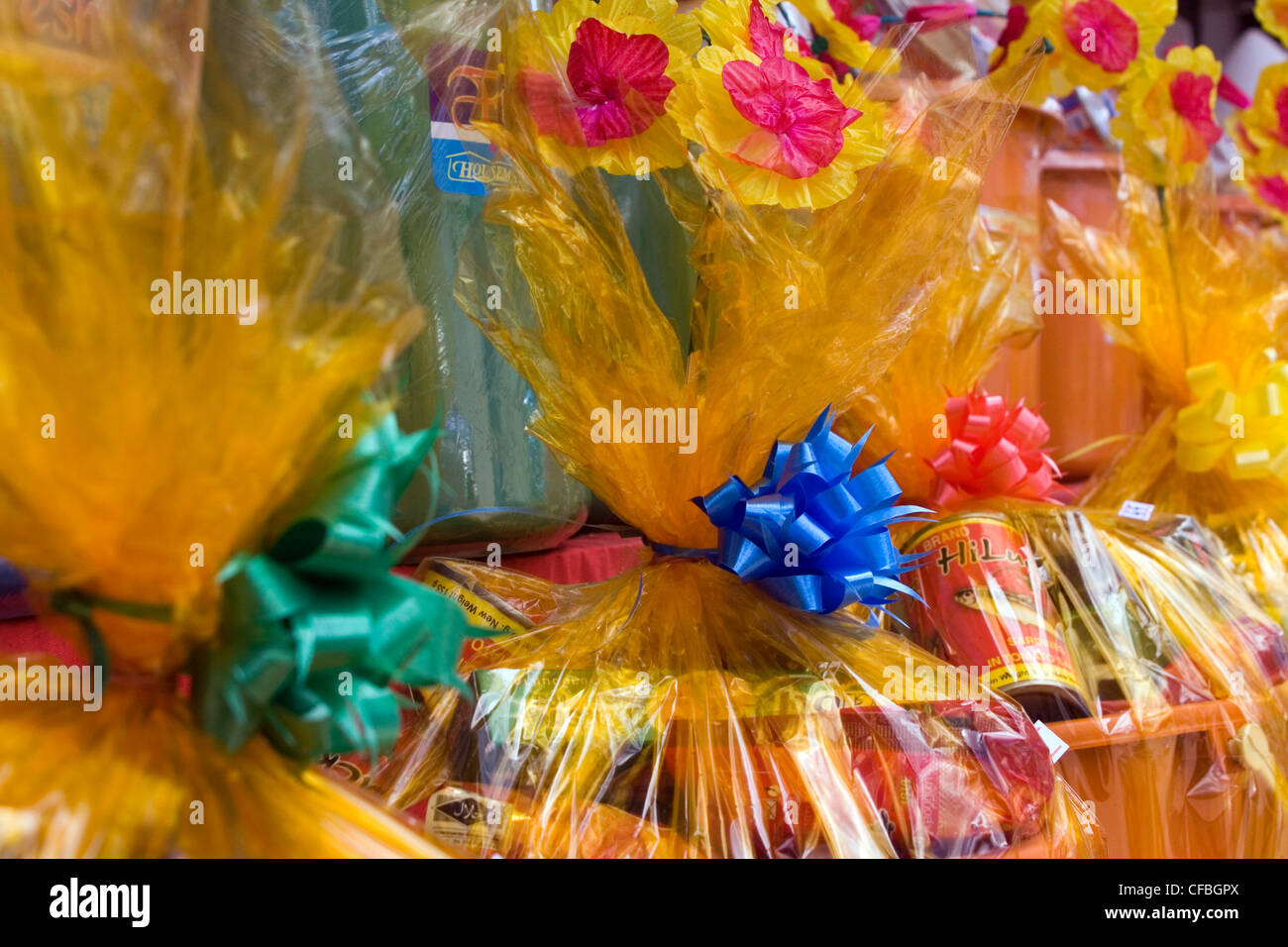 Wrapped gifts given to Buddhist monks as offerings are on display at a ...