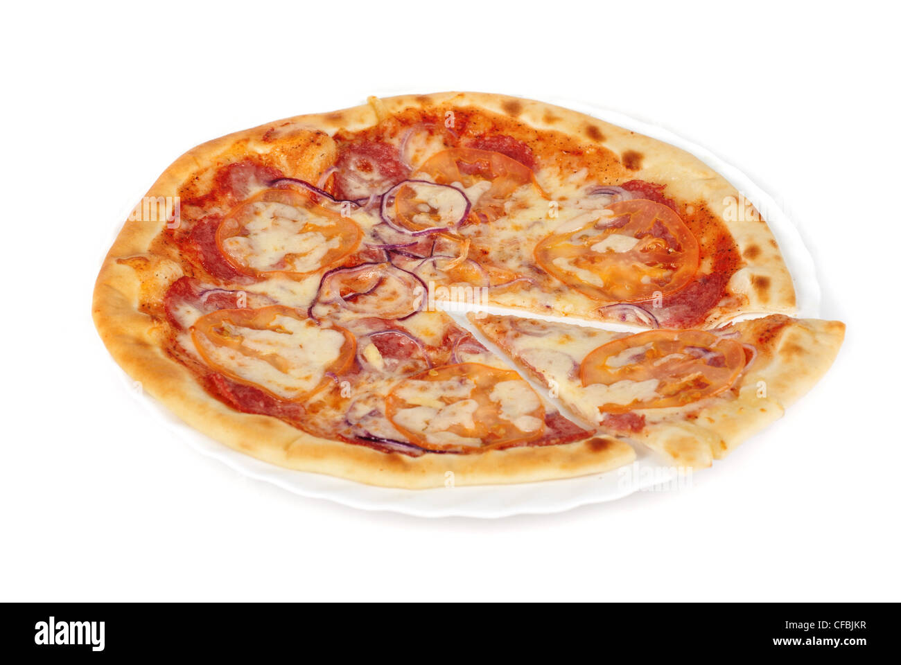 pizza closeup with salami, tomato, onion and mozzarella cheese Stock ...