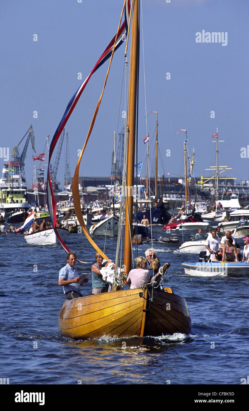 Boats entering Amsterdam harbor during the SAIL 2005 maritime event ...