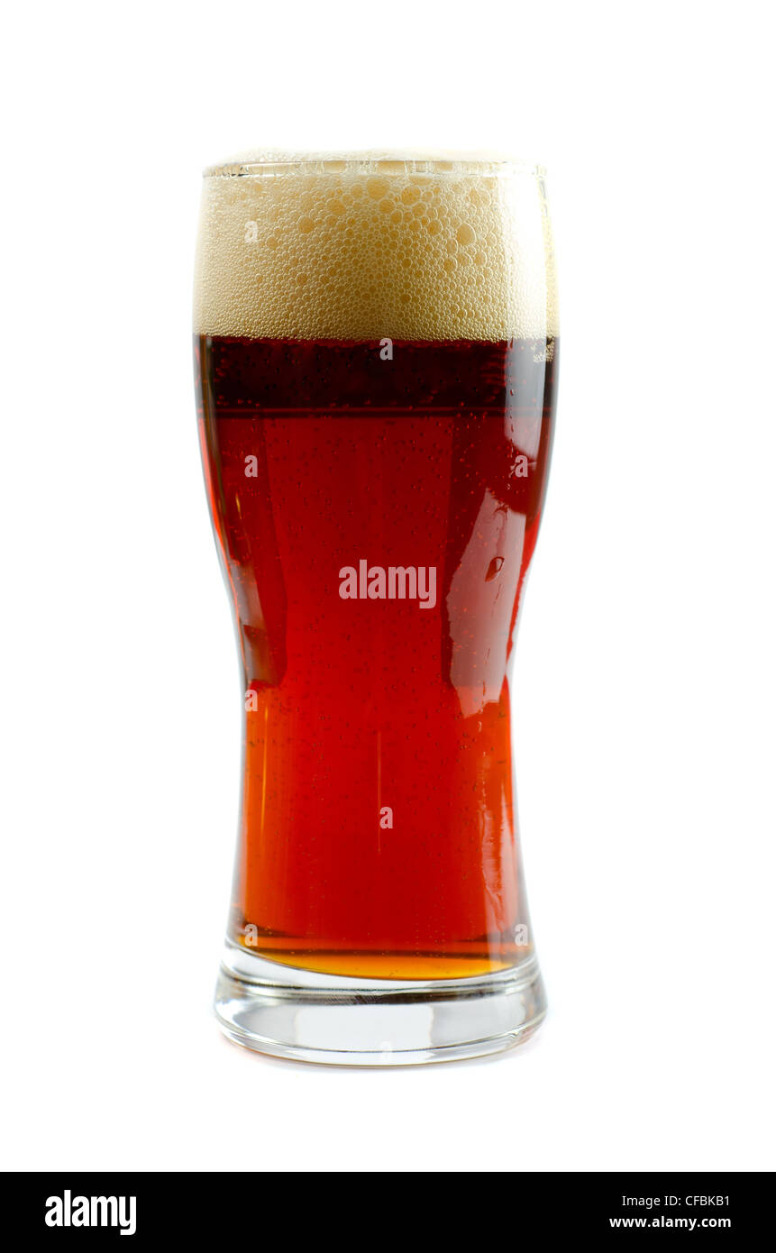 Glass of dark beer isolated on a white background Stock Photo - Alamy