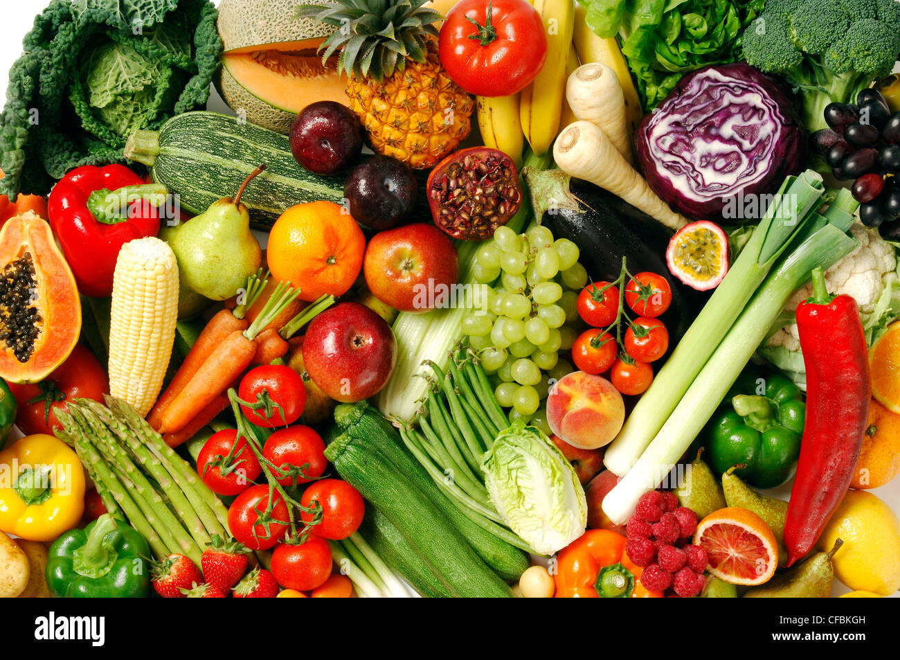 Selection of fruit and vegetables including chilli, cauliflower, green ...