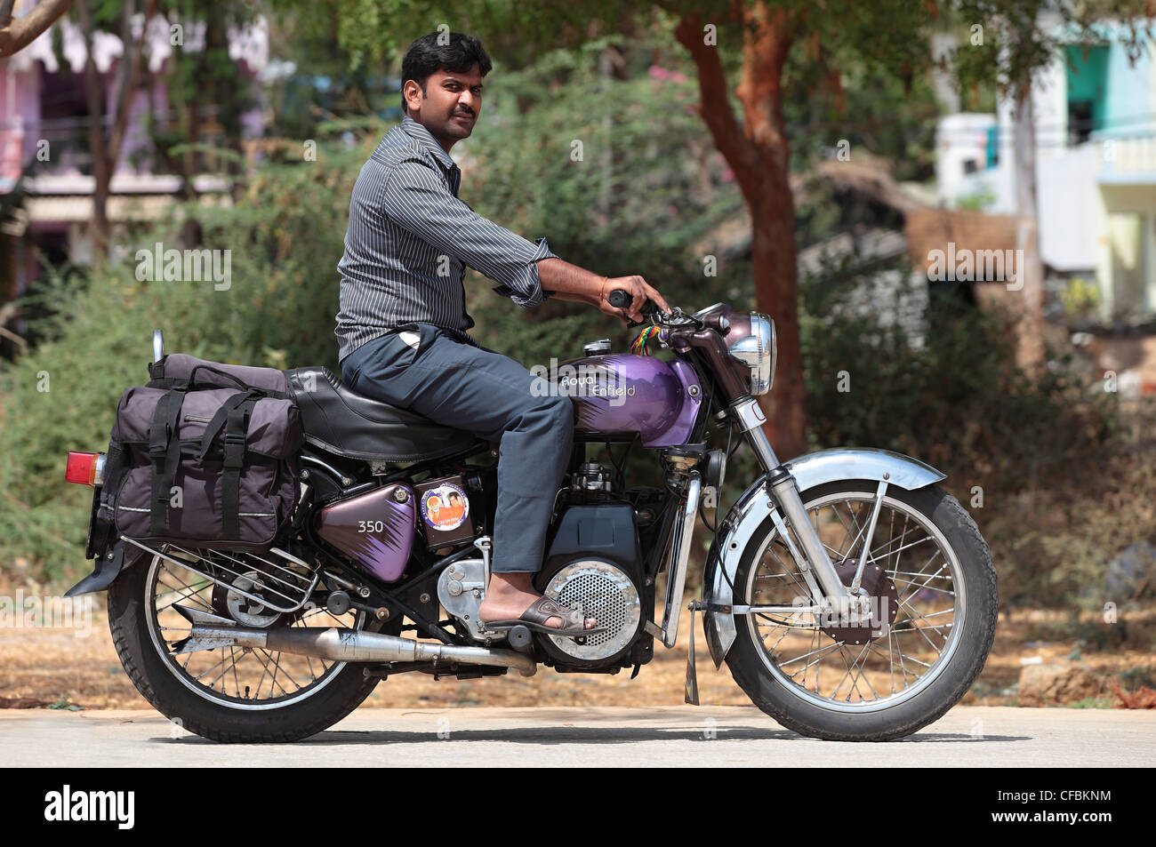 Indian man riding an Royal Enfield diesel Bullet Andhra Pradesh South ...
