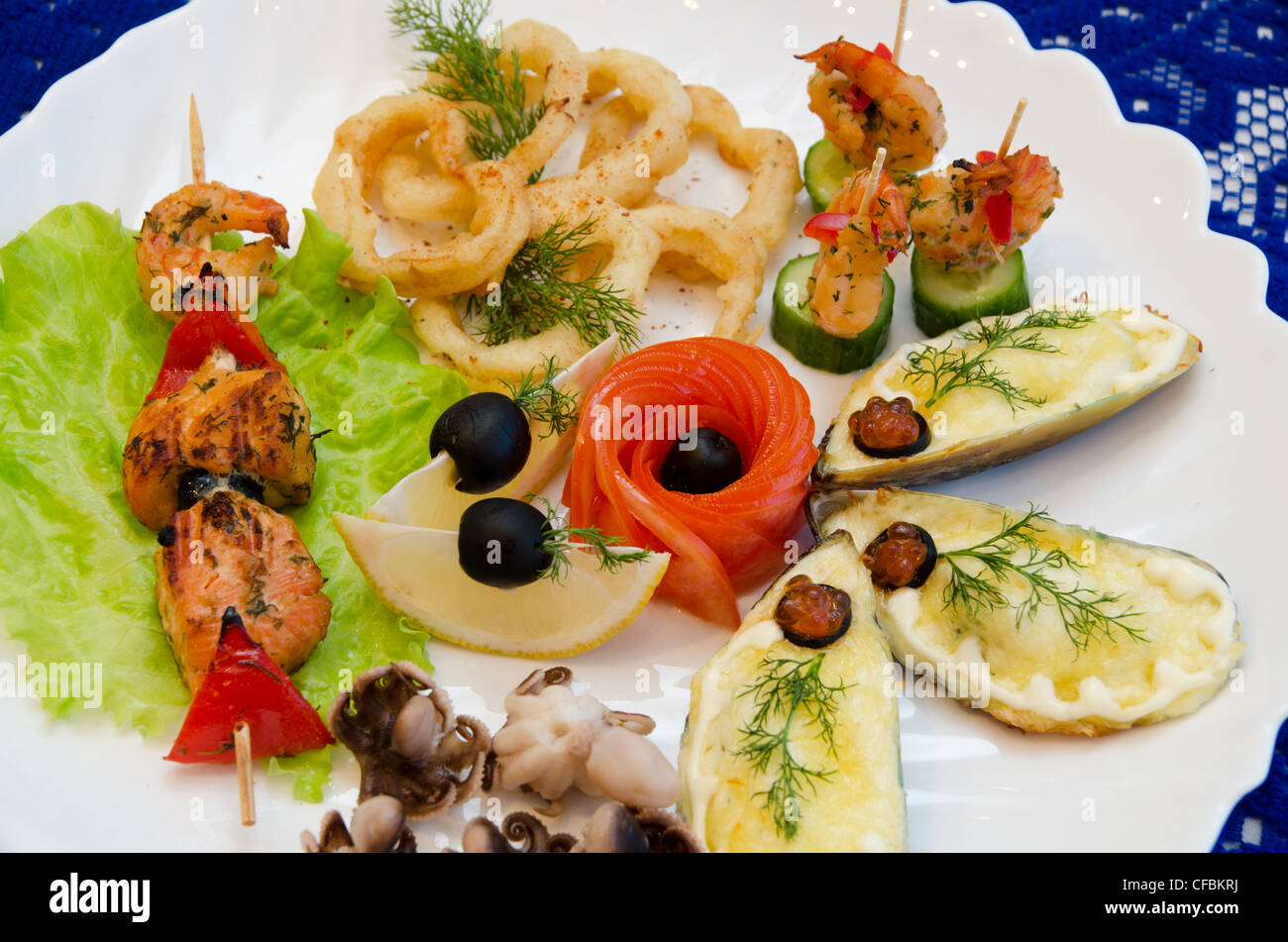 variety eatable seafood set on the dish Stock Photo - Alamy