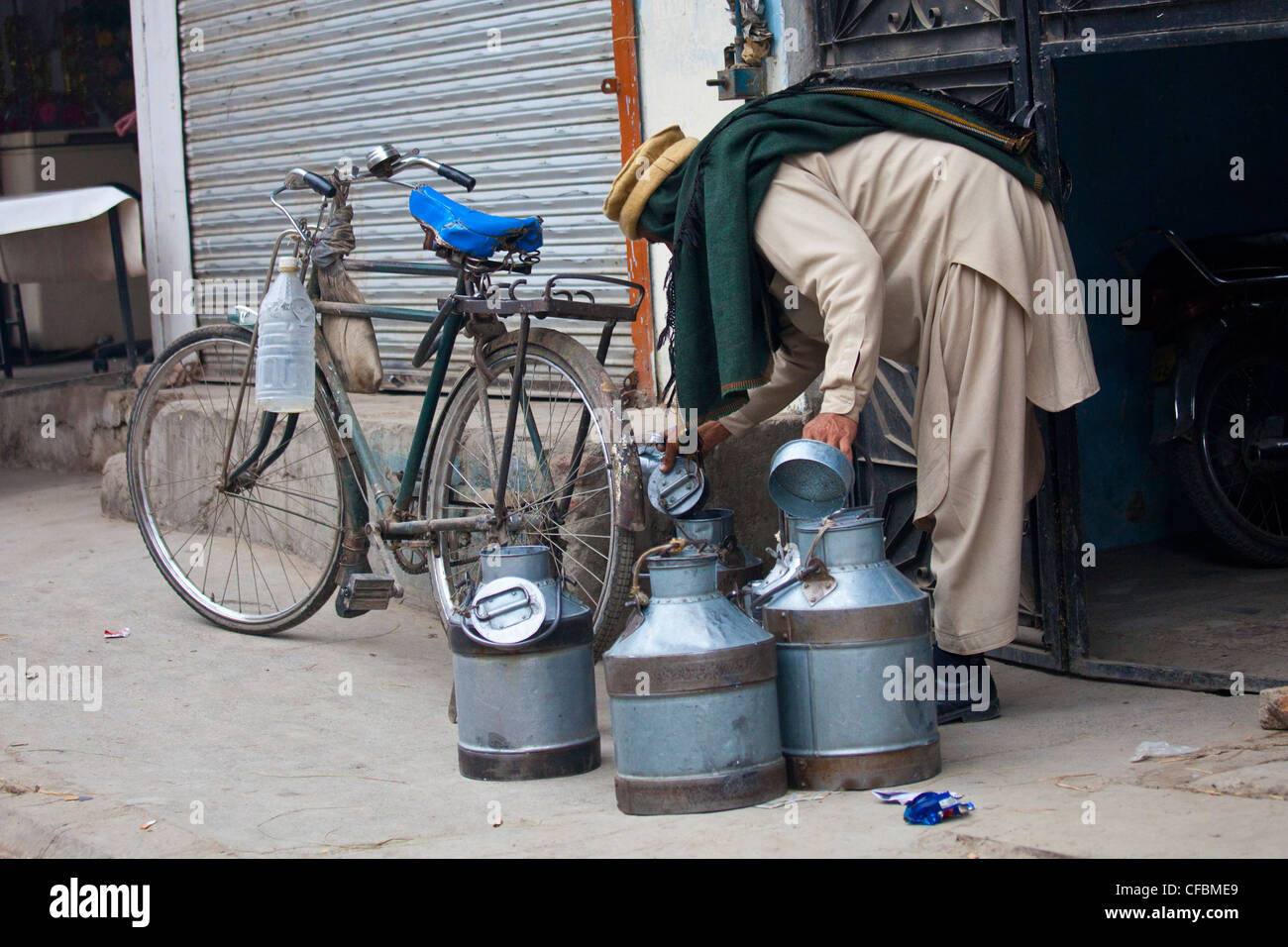 Milkman, Islamabad, Pakistan Stock Photo - Alamy