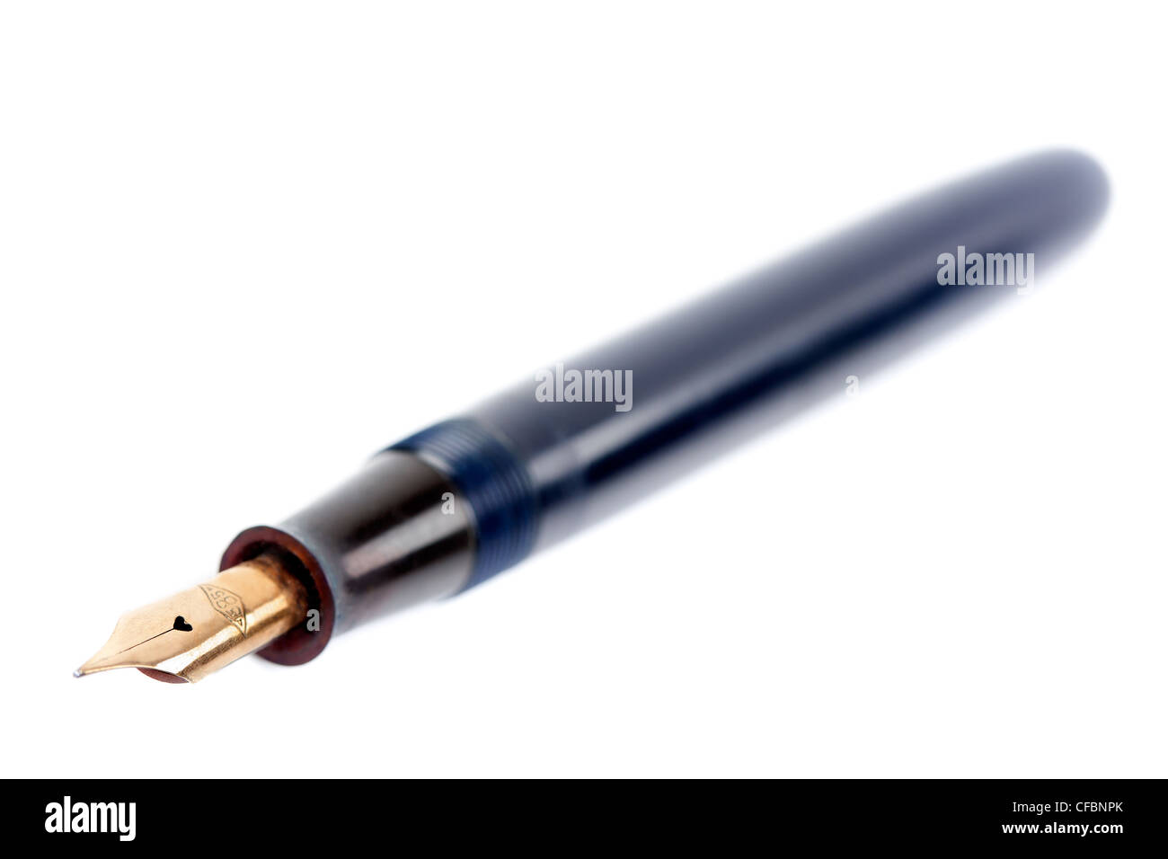 The old pen with gold nib isolated on white background Stock Photo - Alamy