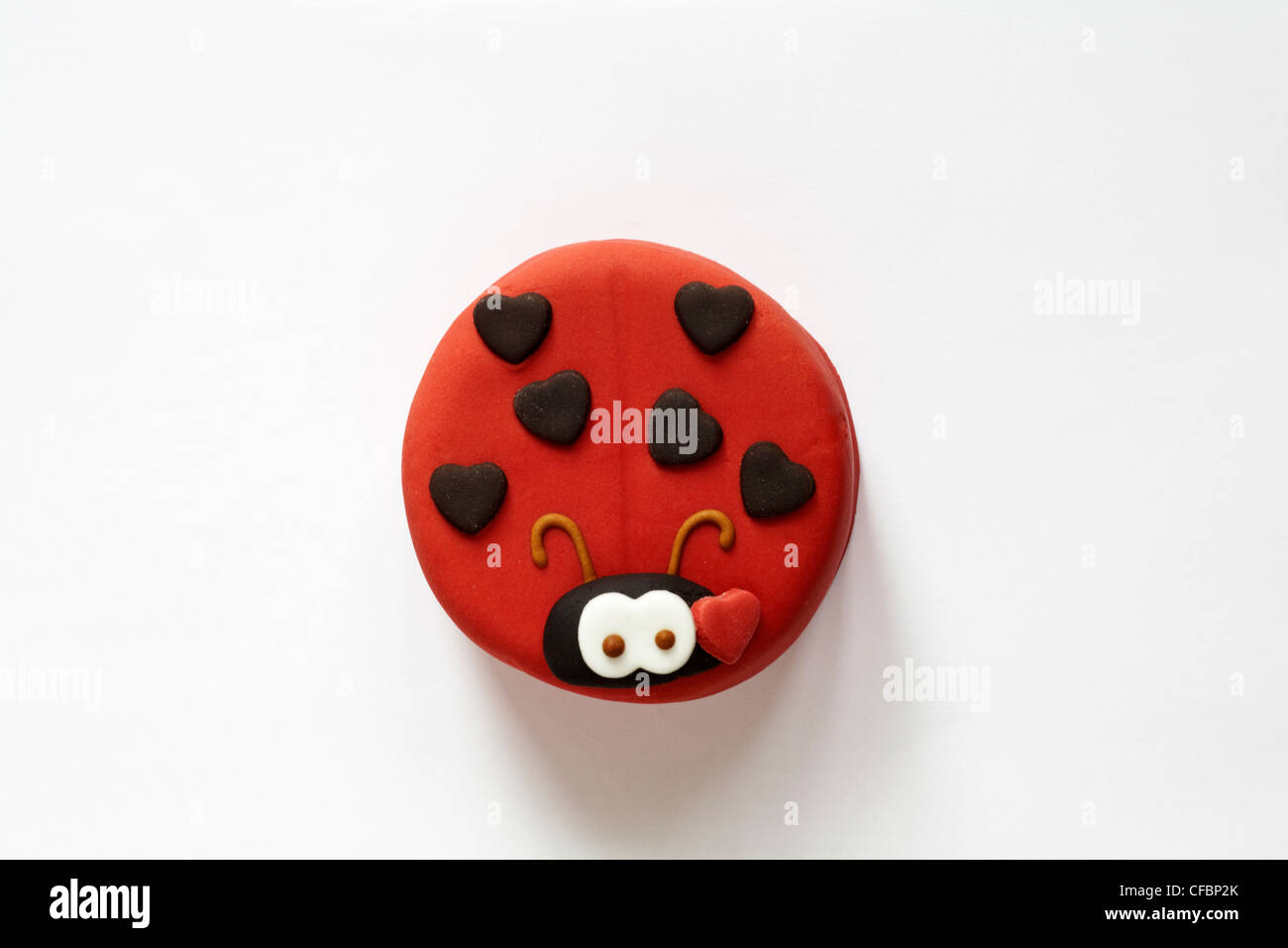 marzipan cake in shape of a ladybird lady bird isolated on white ...