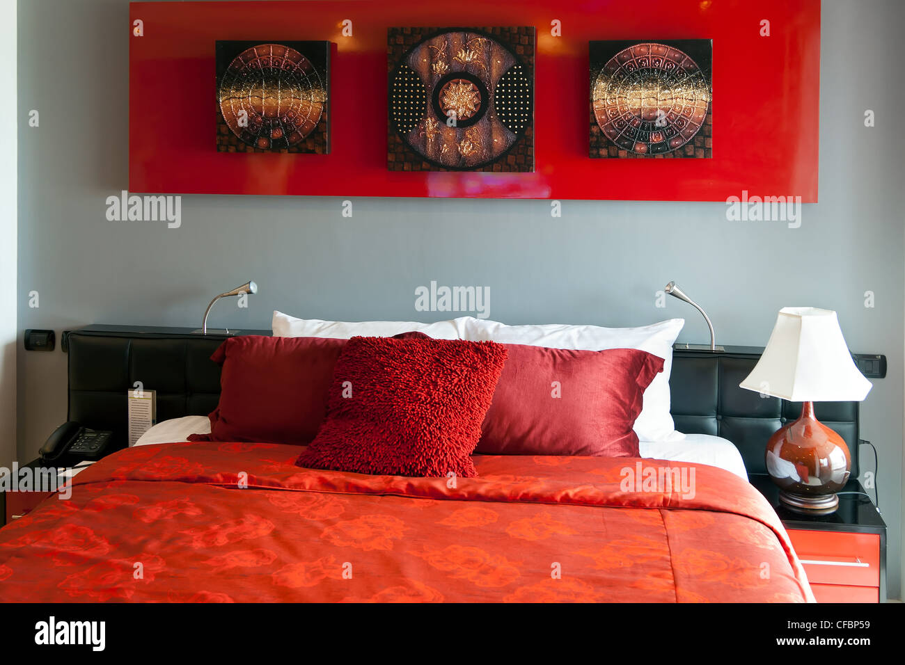 Red luxurious bed in a hotel in Thailand Stock Photo - Alamy