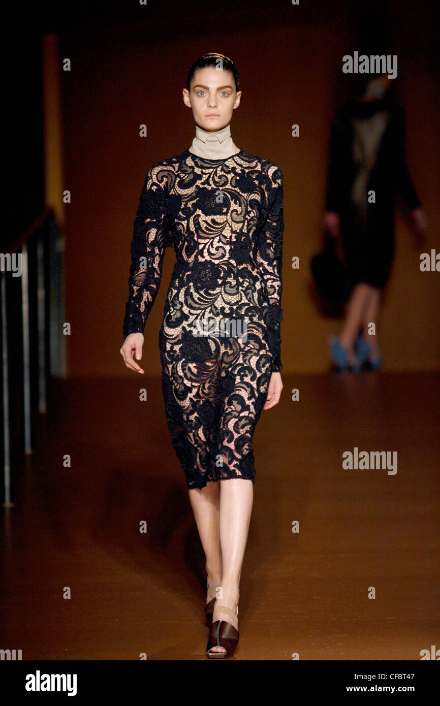 Prada Milan Ready to Wear Autumn Winter Model wearing a navy lace dress ...