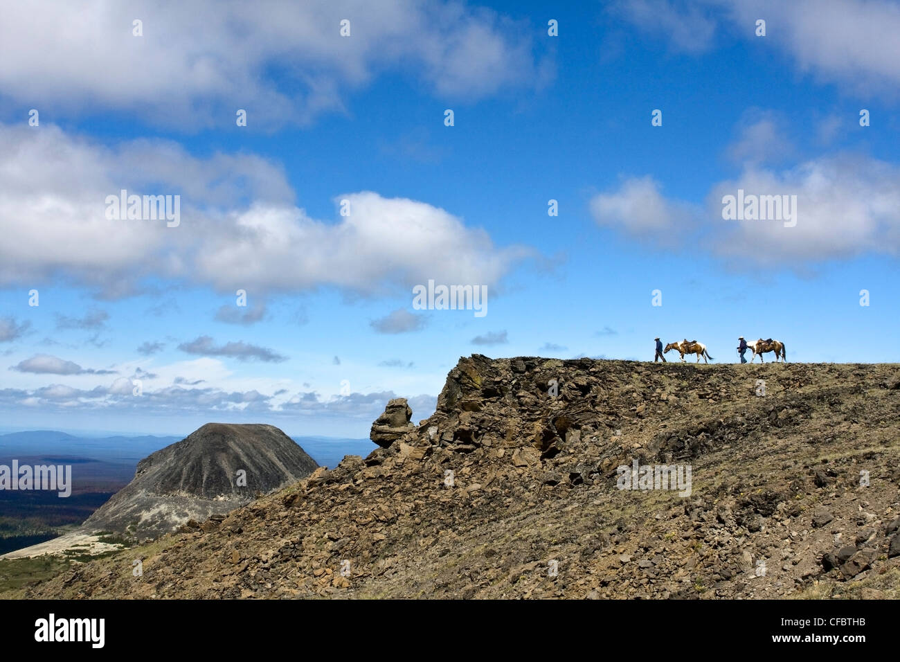 trail riders overlooking Volcanic cone in the Itcha Mountains in the ...