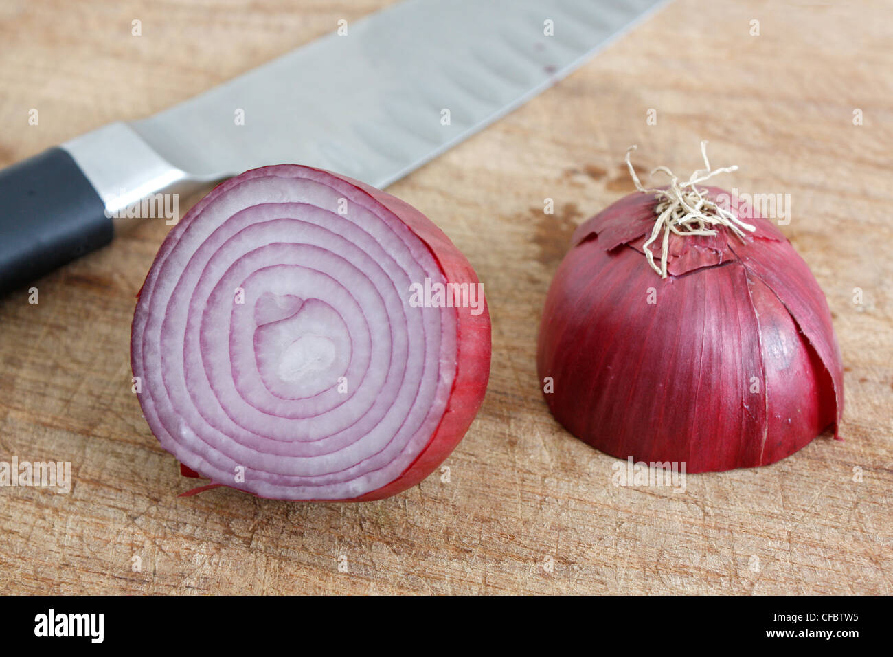 A red onion sliced in half Stock Photo - Alamy