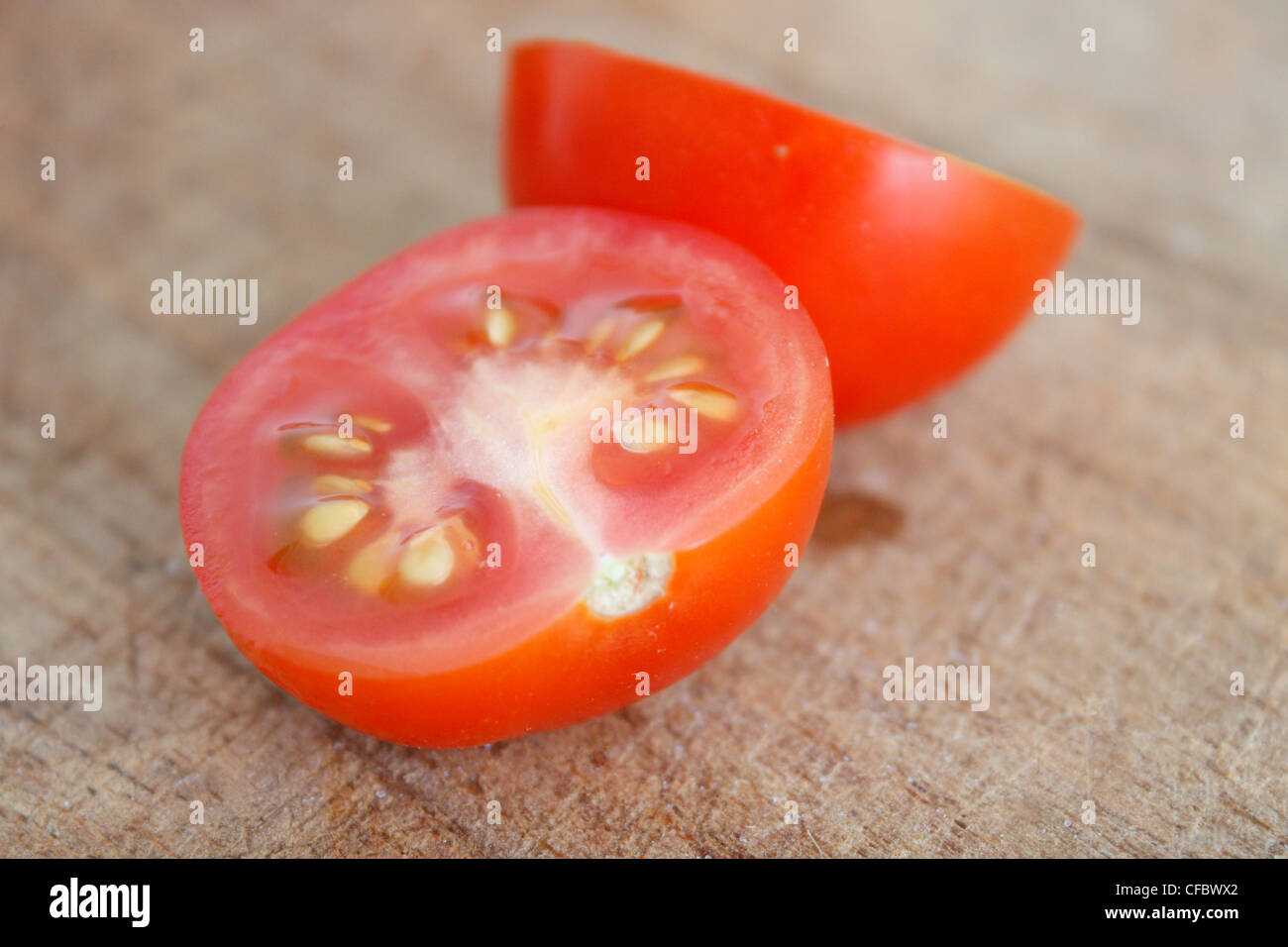 A small sliced tomato Stock Photo - Alamy
