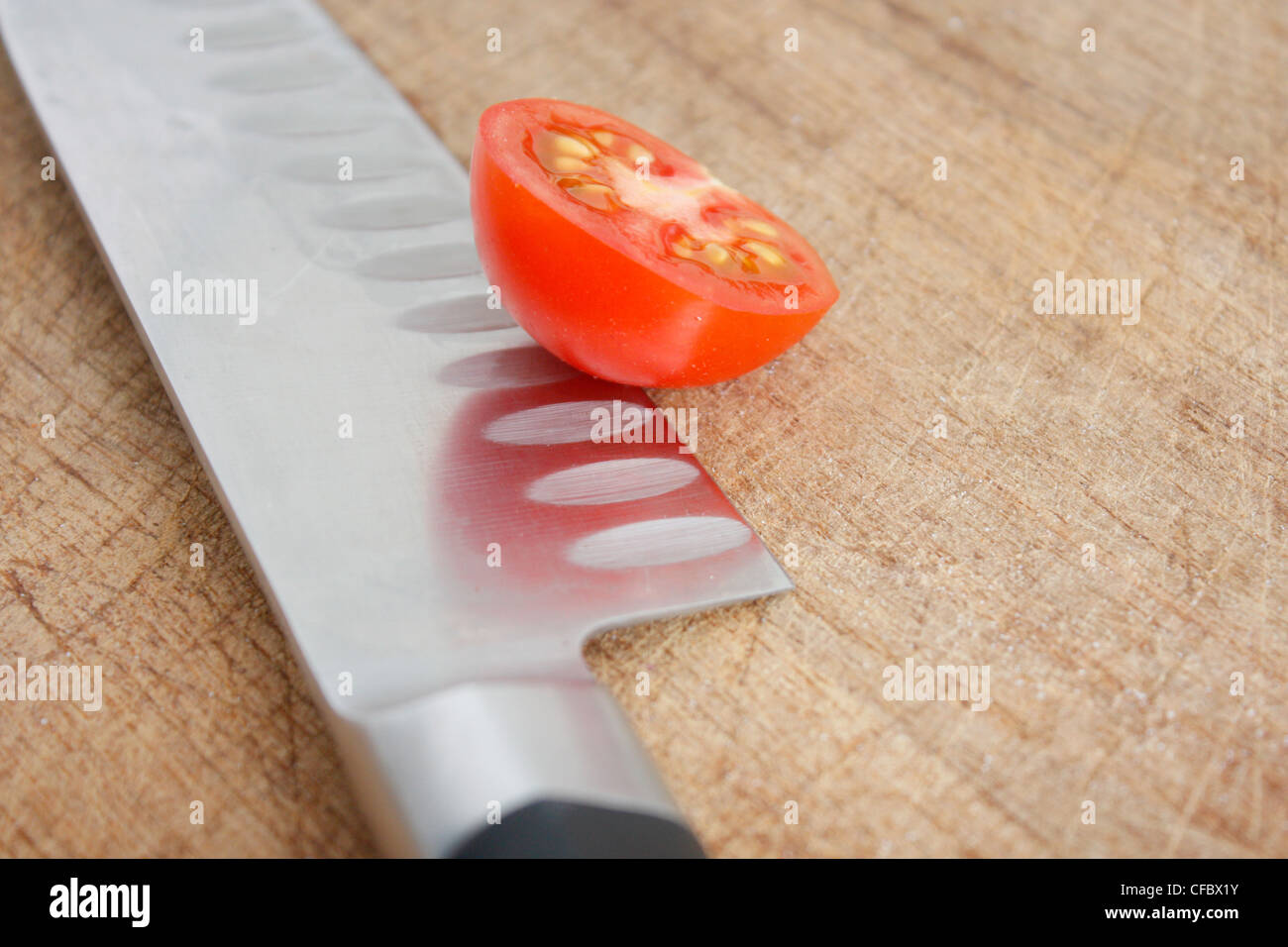 A small sliced tomato Stock Photo - Alamy