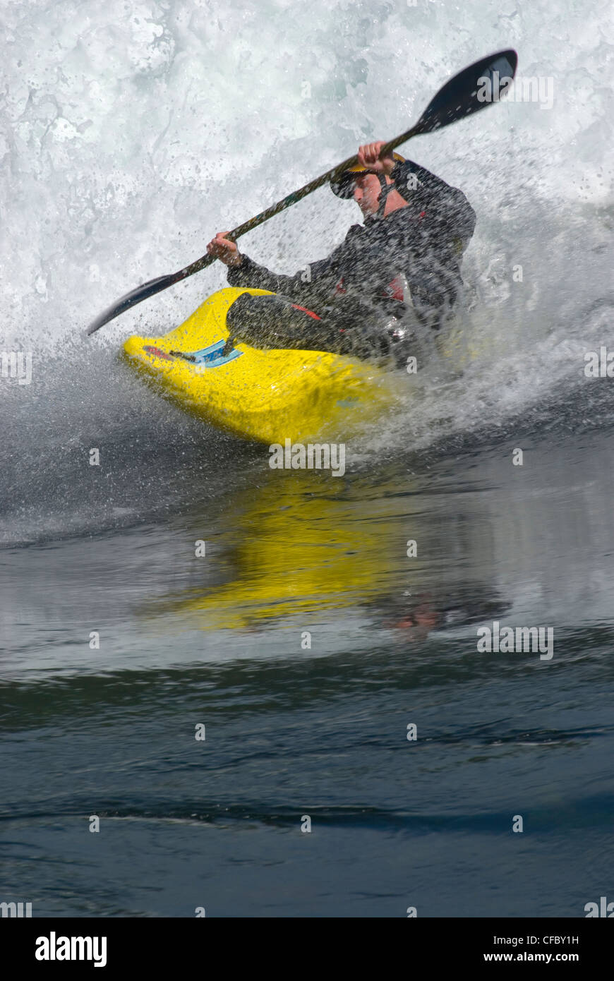 A kayaker plays in the standing waves in Skookumchuck Narrows at ...