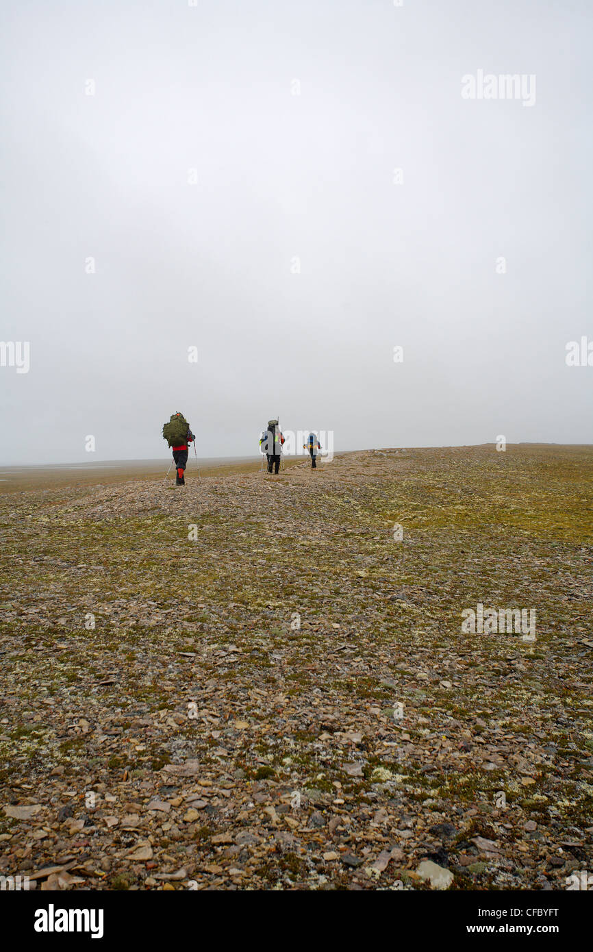 People hiking in the tundra, Simpson Strait, King William Island ...