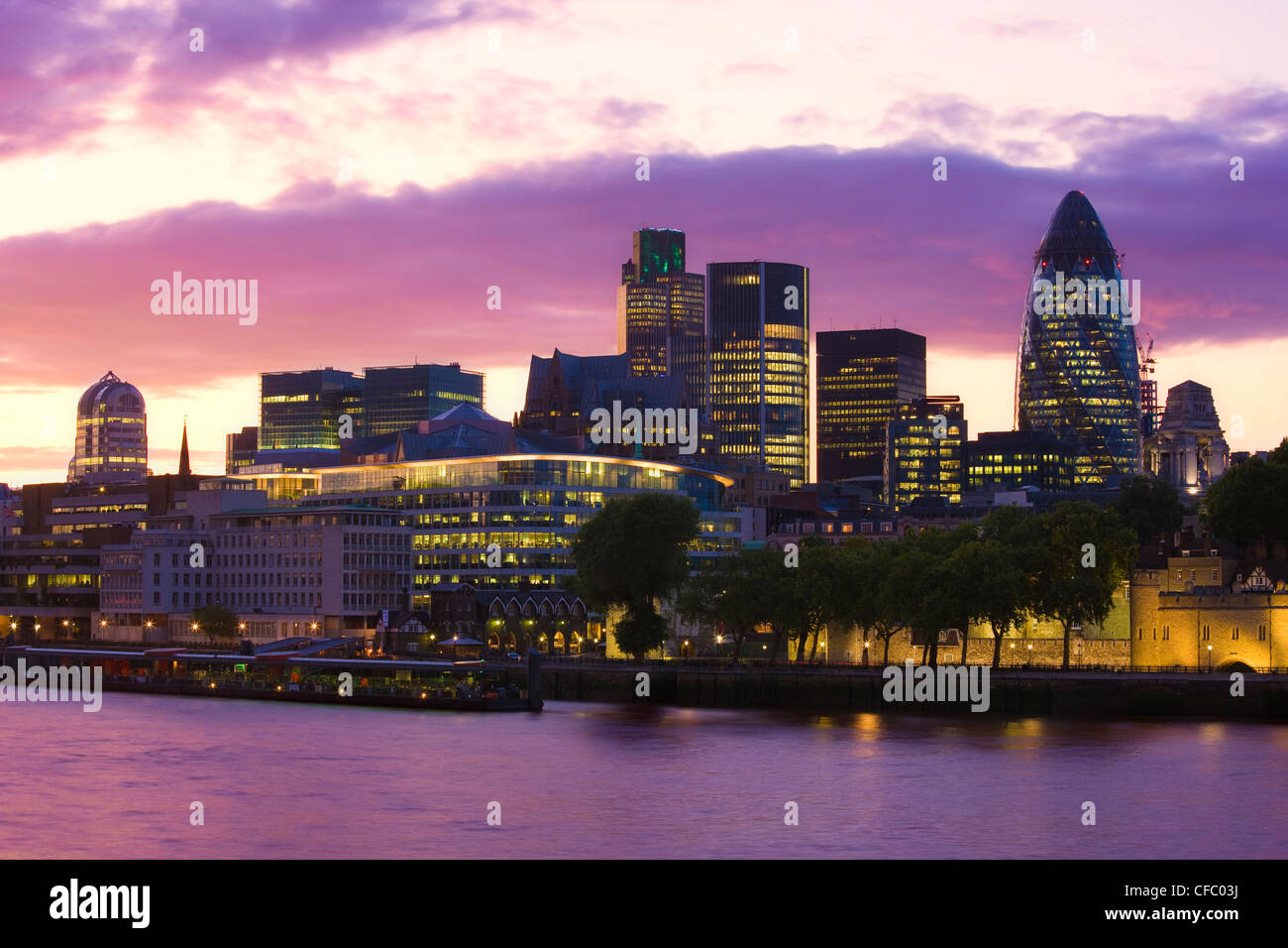 Office Buildings along the Thames River at Dusk, London, England ...